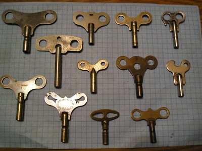 12 ANTIQUE OLD CLOCK KEYS -- Antique Price Guide Details Page