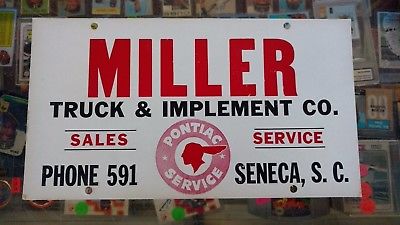 VINTAGE PONTIAC DEALERS LICENSE PLATE TAG, MILLER TRUCK & IMPLEMENT ...